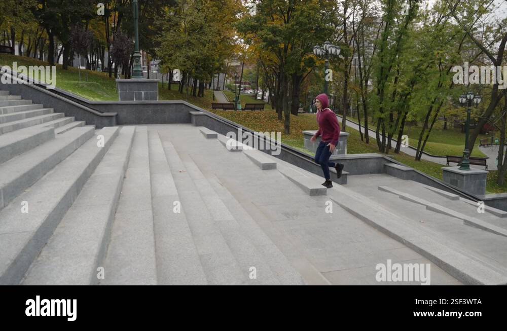 Slow motion man running on stairs Stock Video Footage - Alamy