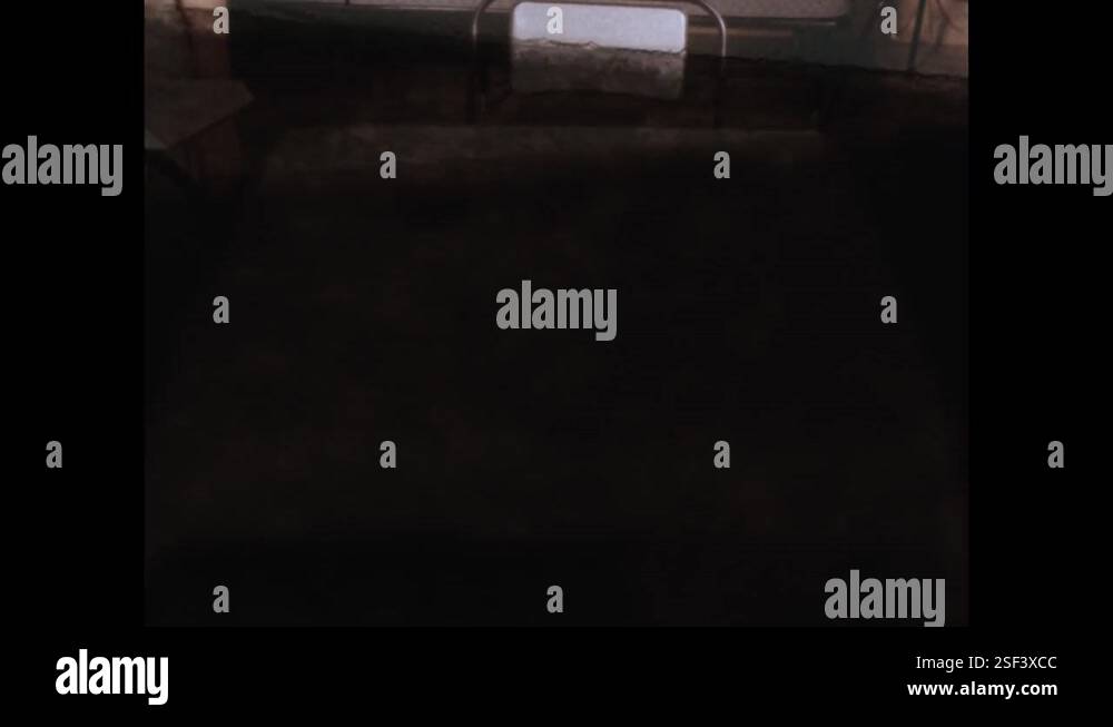 1960s: drawing supplies on table, checking drawing of checker board in ...