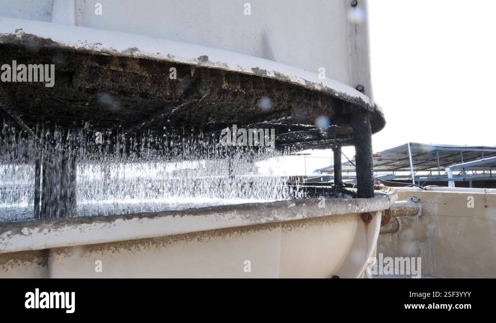Close View Of Water Dripping Through Filtration Net Into Tank. Slow ...