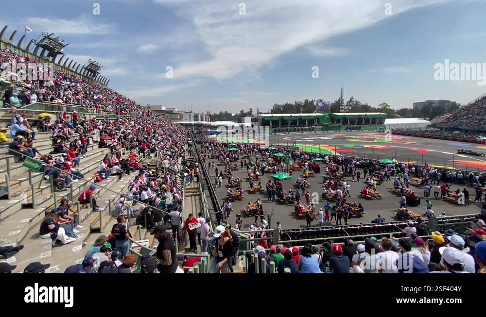 People fans spectators arriving to the Grandstand foro sol auditorium ...