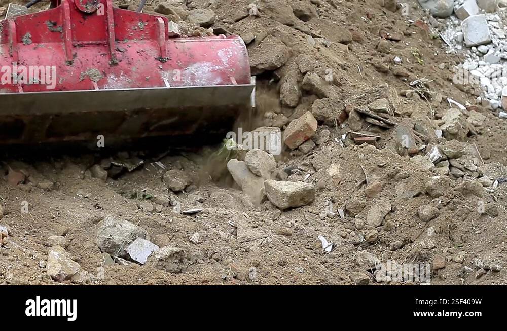 digger excavating Earth from a building site stock video Stock Video ...