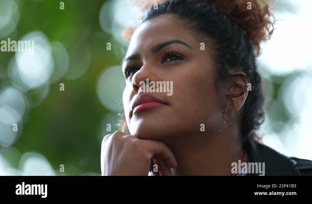 Pensive worried black woman face close-up. Person feeling anxiety and ...
