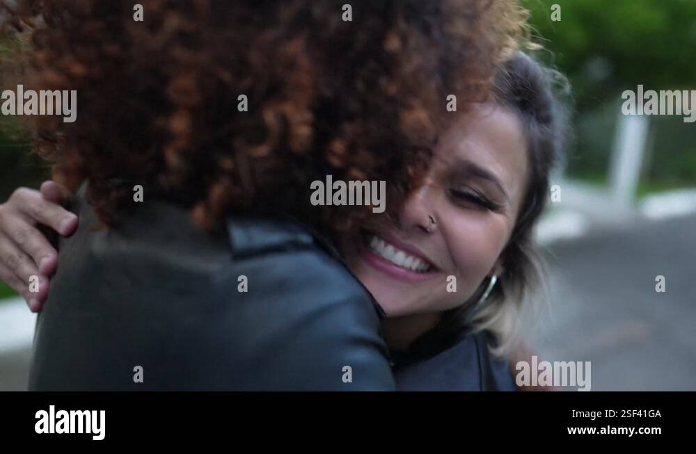 Two women hug Stock Videos & Footage - HD and 4K Video Clips - Alamy