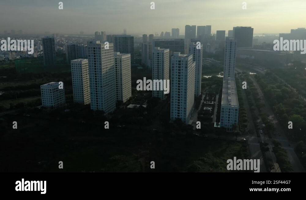 Drone counter clockwise orbit around large multi-tower residential ...