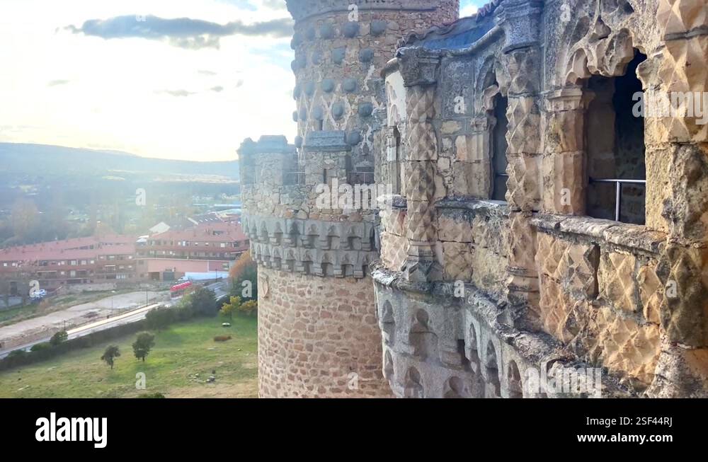 Rising video revealing the facade of a large medieval castle with the ...