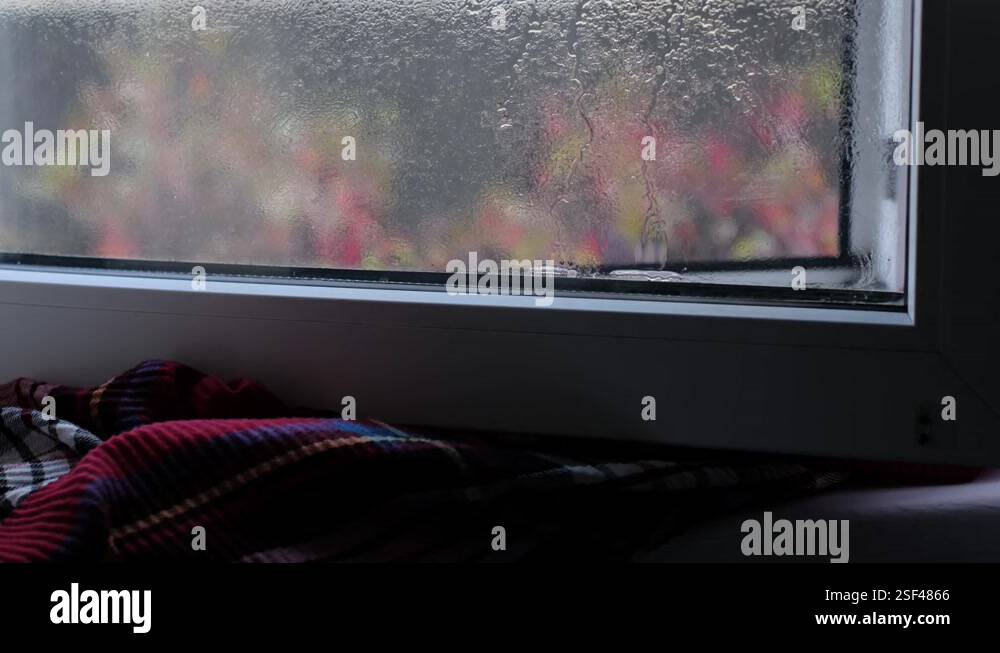 rain days, heavy rain falling on window surface. bad weather concept ...