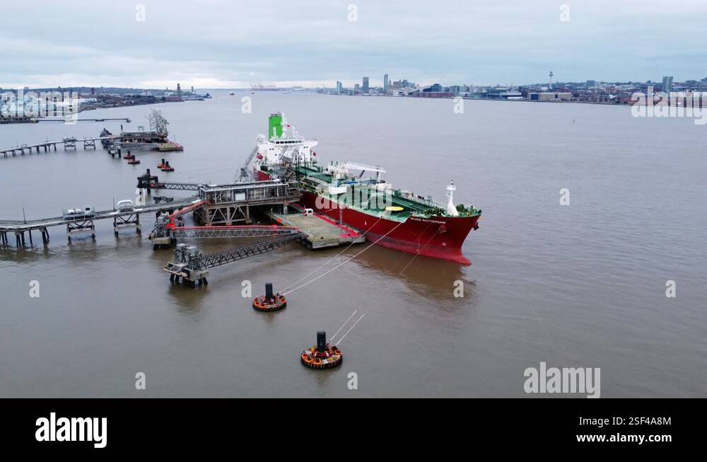 Silver Rotterdam chemical oil tanker ship loading at Tranmere terminal ...