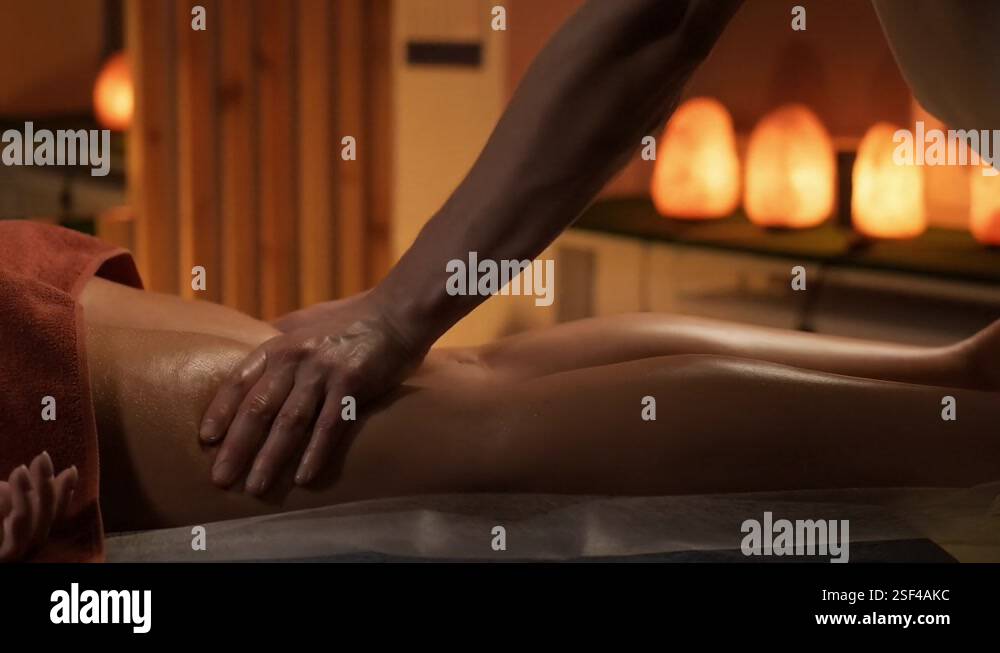 Young woman getting leg and feet massage with oil in resort spa salon Stock Video Footage - Alamy