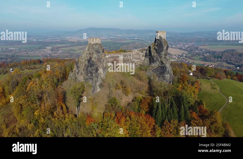 aerial view of ruins of a czech castle Trosky in autumn, orbit, suny ...