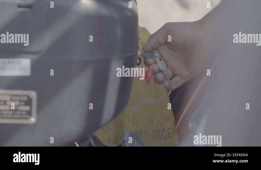 Tractor driver cranking up and driving a tractor. Slow Motion 100 fps ...