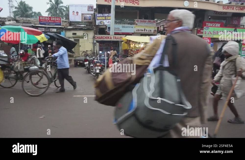 streetview in Puri, Odisha. people and commercial stores at town center ...