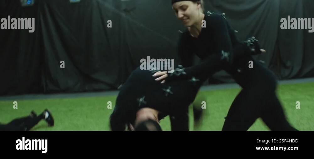 Actors in motion capture suits performing some fight moves as game ...