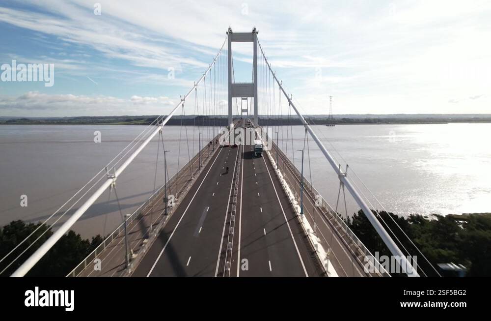 Traffic on cable stayed bridge over wide river estuary Stock Video ...