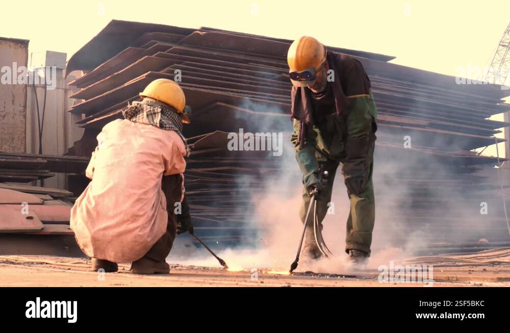 Ship Breakers Using Blow Torch On Sheet Panel On Floor At Gadani Stock ...