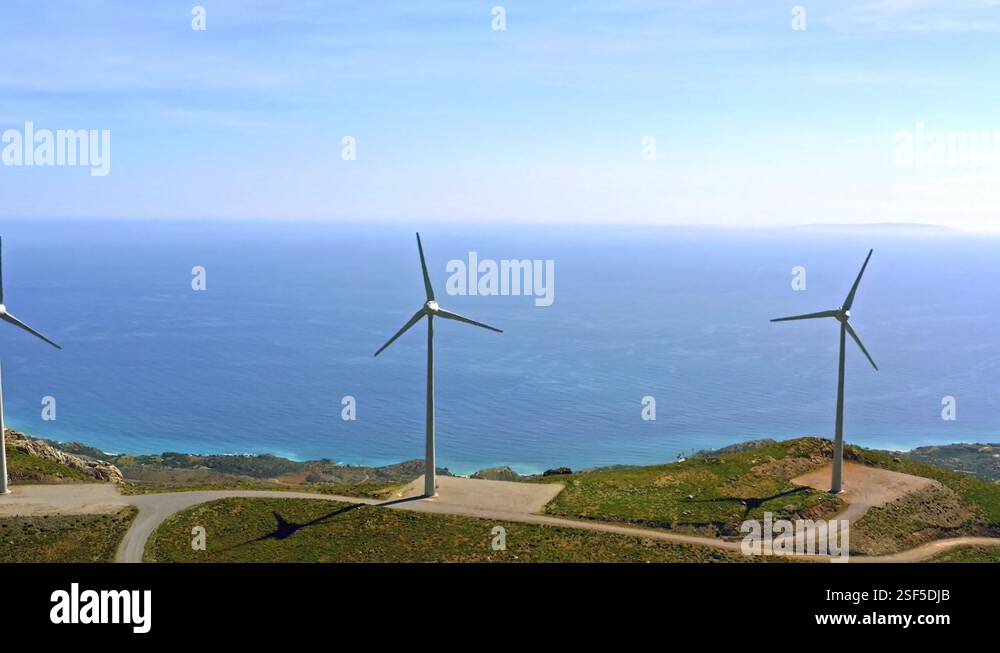 Wind farm turbines on mountain in Crete, Greece. Clean energy landscape ...
