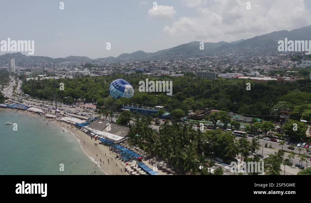 Parasailing on the beach of Acapulco. Playa El Morro (close up Stock ...