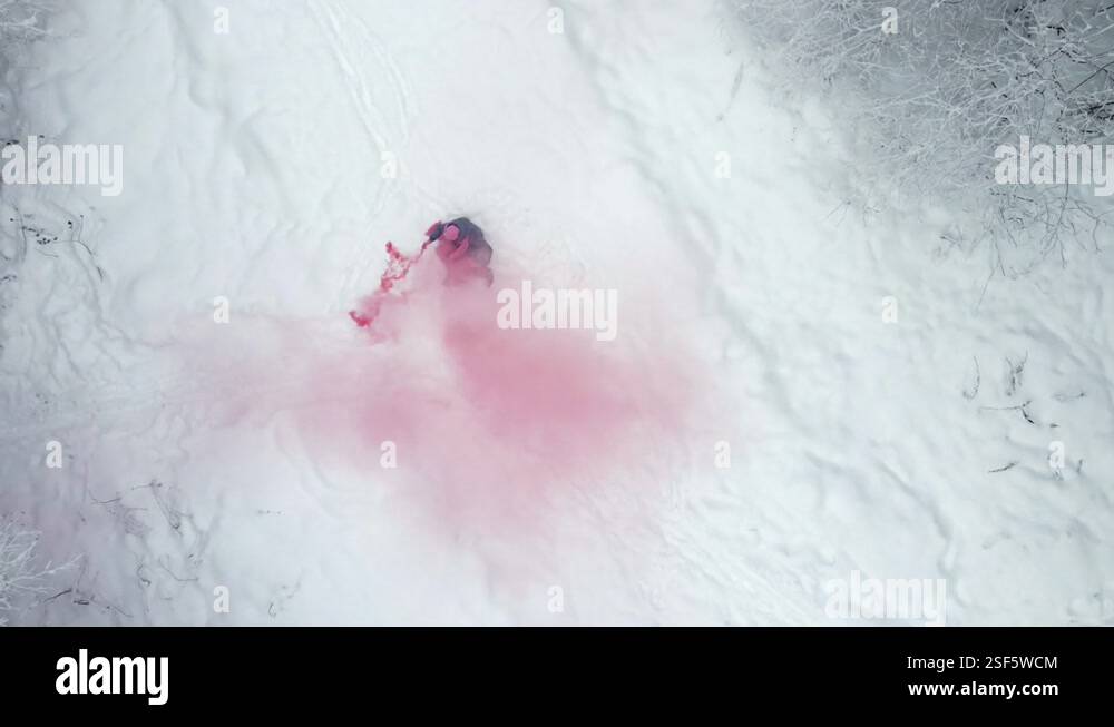 woman in pink clothes a scarf and a hat is spinning around the axis ...