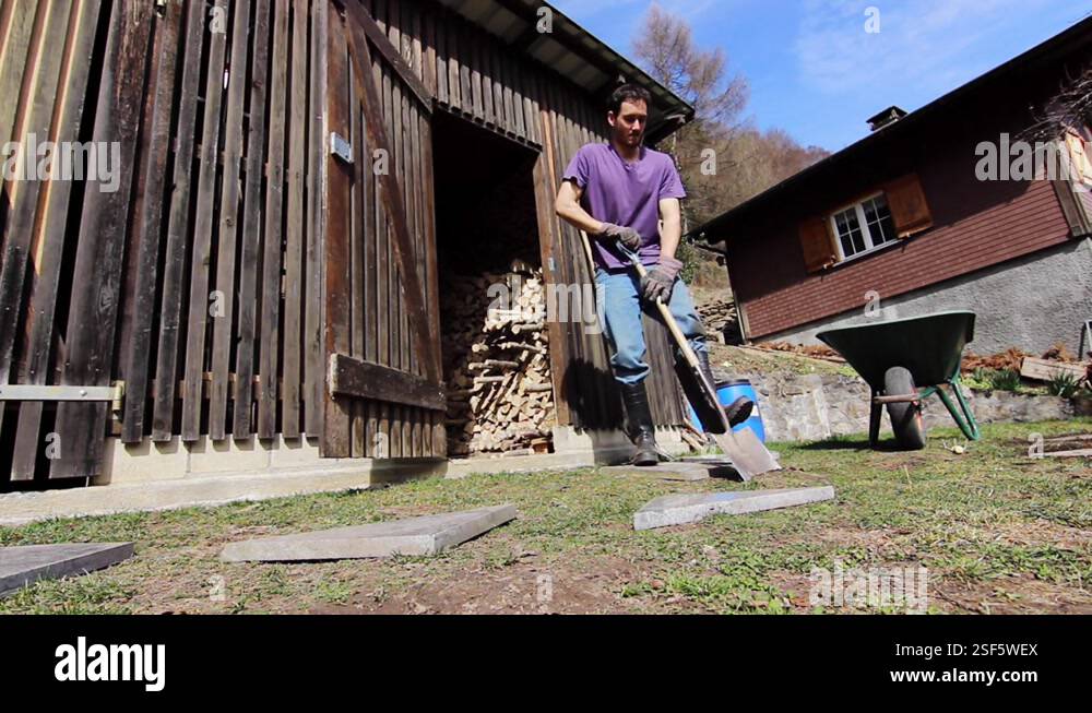 Digging up garden lawn grass a sustainable eco farm Stock Video Footage ...
