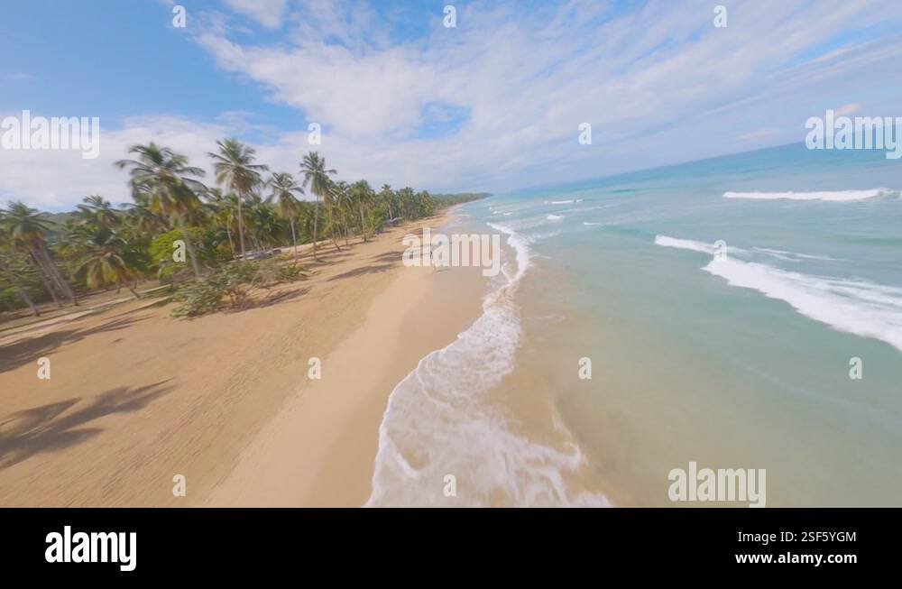 Playa Coson, Las Terrenas in Dominican Republic. Aerial racing drone ...