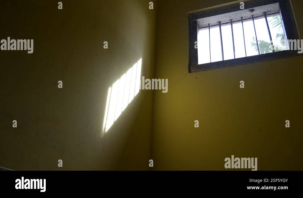 A beam of sunlight that enters through the ventilation of the room ...