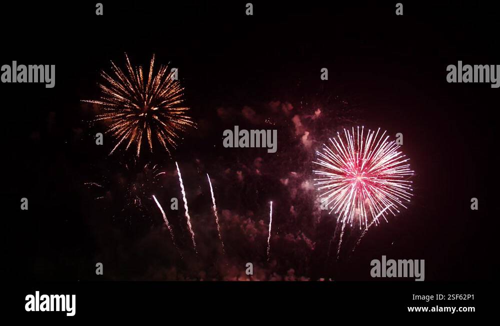 Big real fireworks display celebration and colorful New year's eve. An ...