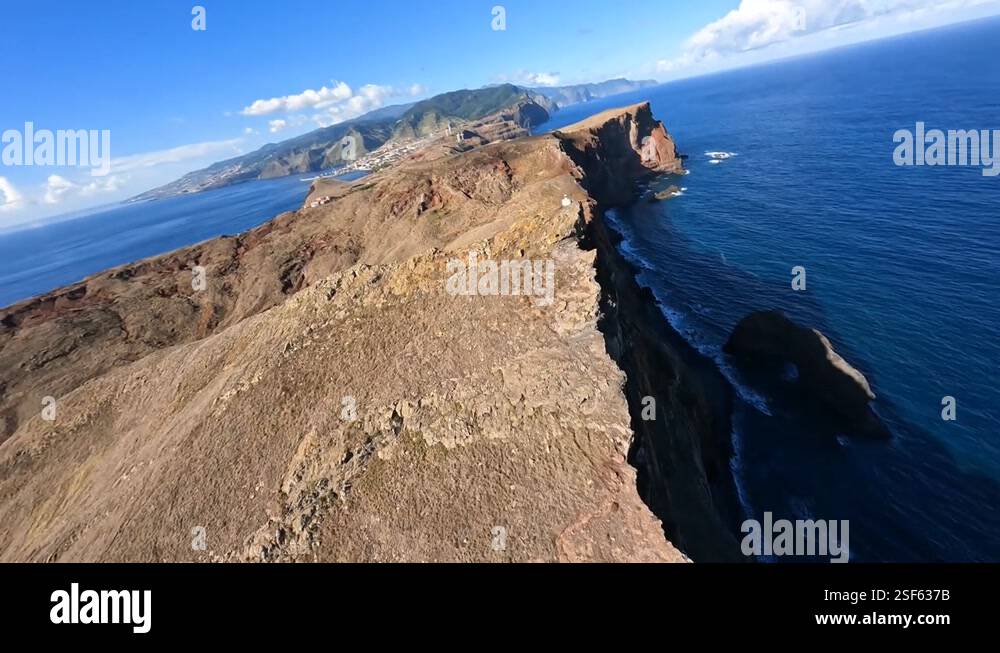 FPV racing drone Mountain surfing, and cliff diving along the rocks ...