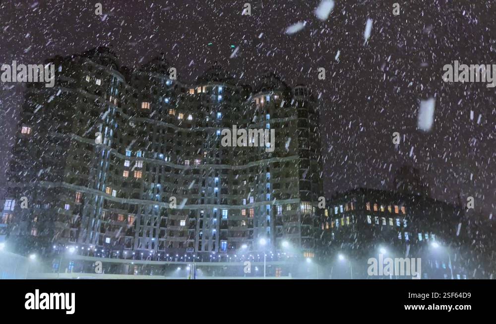 Heavy Snowfall in Kyiv Ukraine. Winter nights and tall buildings Stock ...