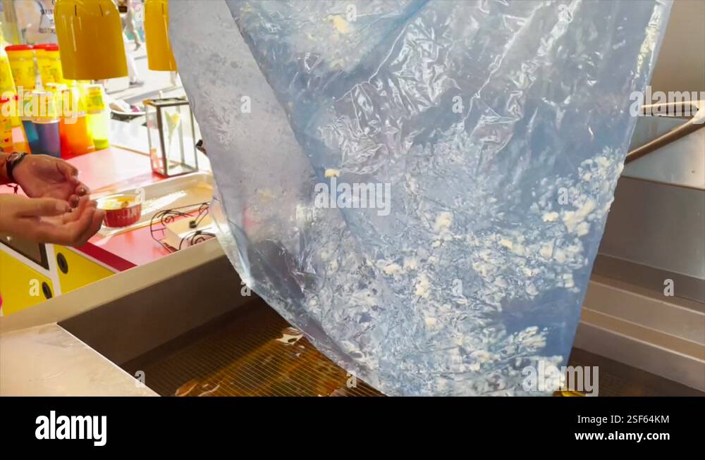 Saving grease from grease cube plastic packaging Stock Video Footage ...