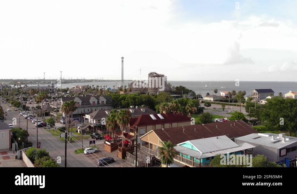 Theme park in front of water at Kemah Boardwalk in Texas (60fps drone ...