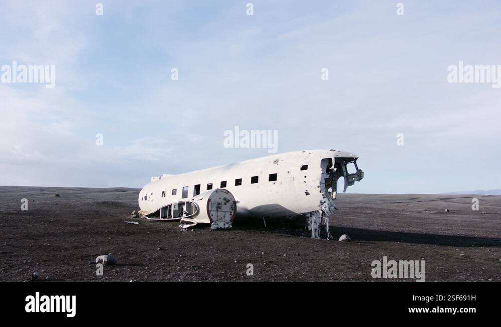 View of the apocalyptic wreck of a plane that crashed on the black sand ...