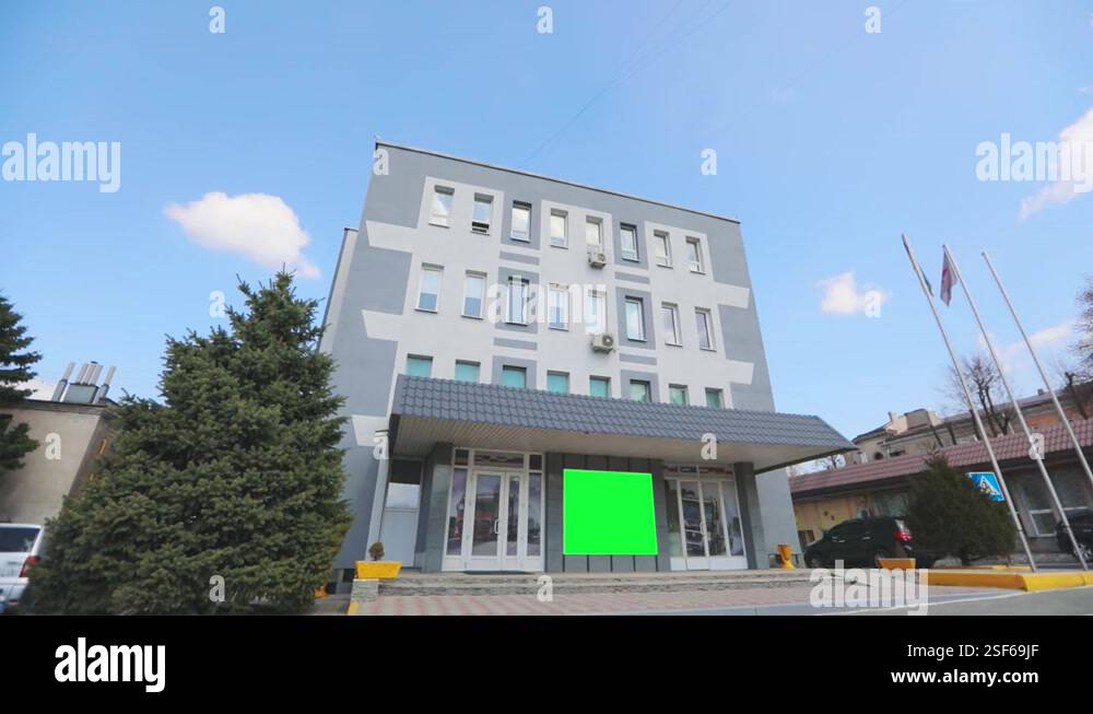 Office building with green screen. advertising banner green screen. An ...