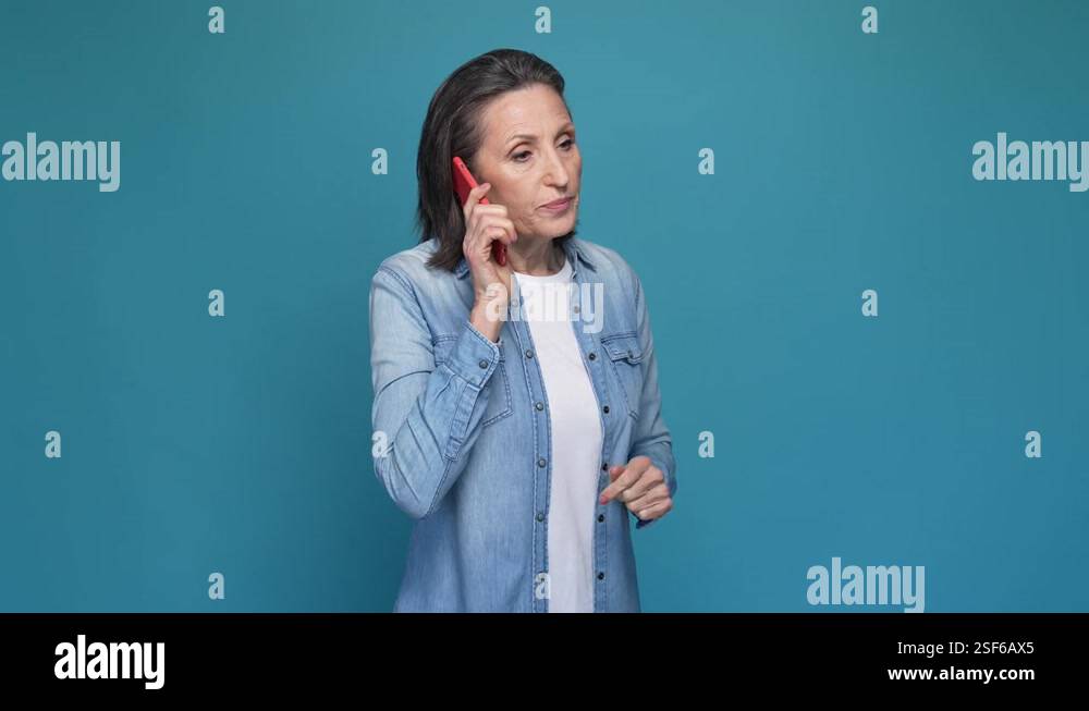 Furious lady call smart device scream isolated blue color background ...