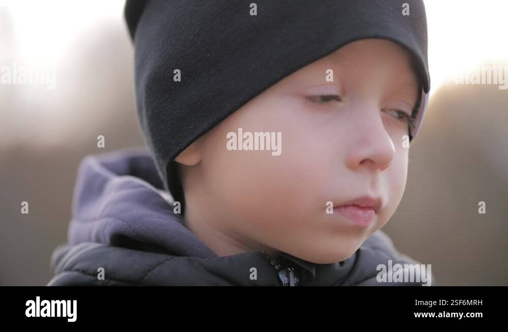 Portrait of a crying little boy. The child is hysterical. Psychosis ...