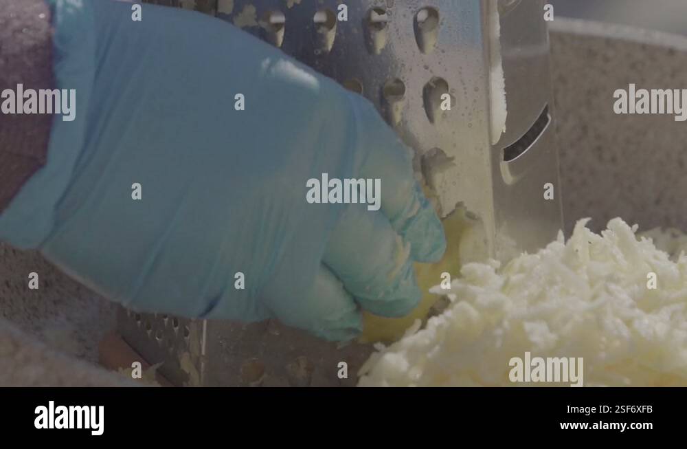 Peel, cut and grate the quince for compote. Slow Motion 100 fps Stock ...