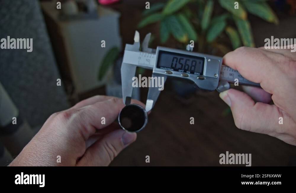 Industrial worker measure detail with digital caliper Stock Video ...