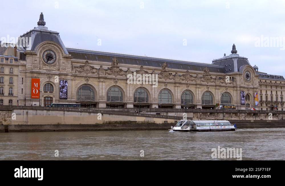 Bateau bus boat cruising in front of the Orsay museum in Paris, France ...