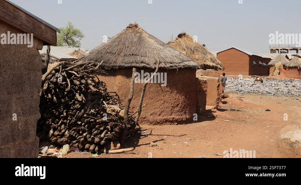 Traditional mud homes boy and goat Gambaga Ghana Africa 4K Stock Video ...