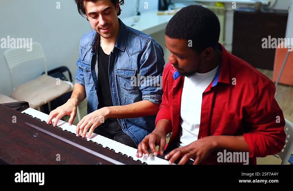 teacher practicing vocal cords with man in class day time Stock Video ...
