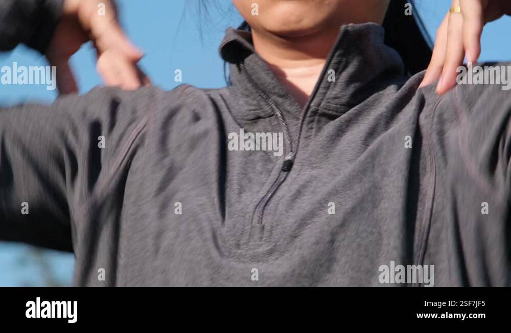 woman warming up exercise and stretching her muscle before jogging in ...