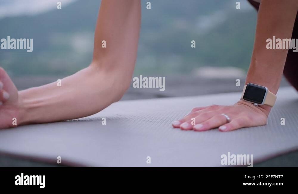 Athlete wearing smartwatch, walking plank exercise Stock Video Footage ...