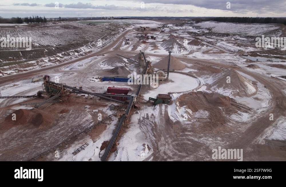 Spinning Birdseye View of Gravel Pit and Machines for Mining in Quarry ...
