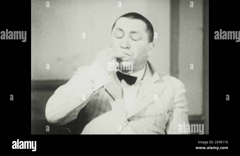 1930s: Jury talks. Curly sits on witness stand chewing gum. Judge yells ...