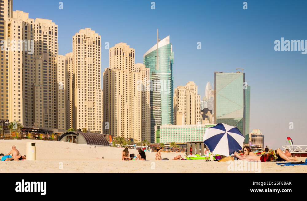 sunny day dubai marina bay beach 4k time lapse uae Stock Video Footage ...
