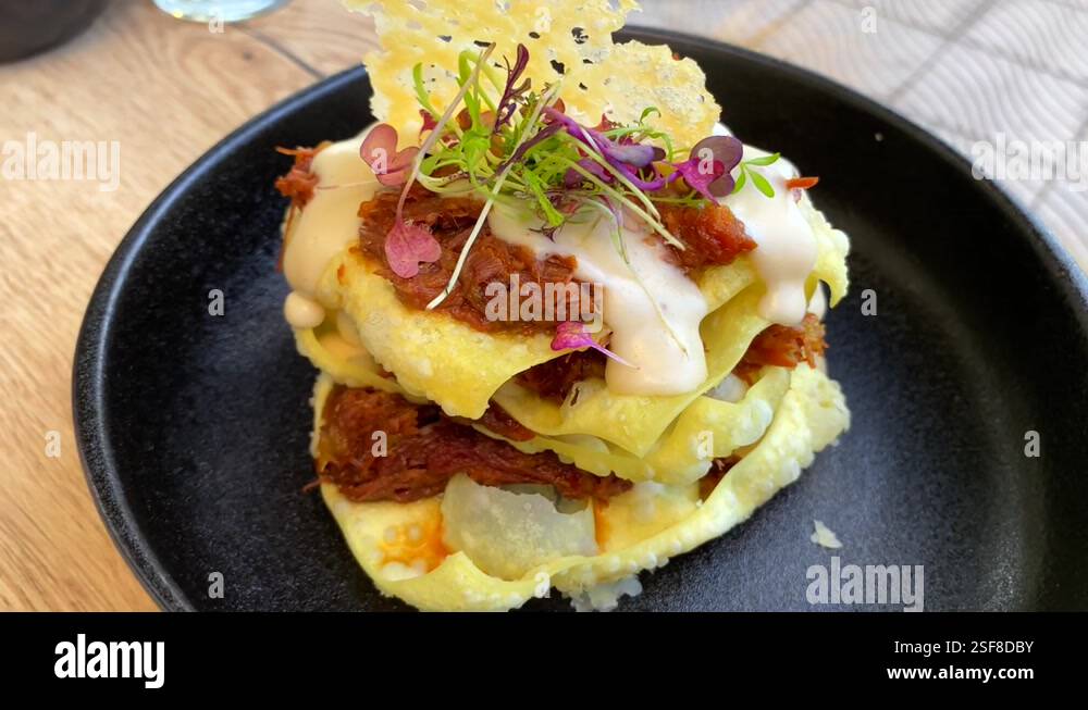 Creative duck lasagna tapas with melted cheese and green sprouts, 4K ...