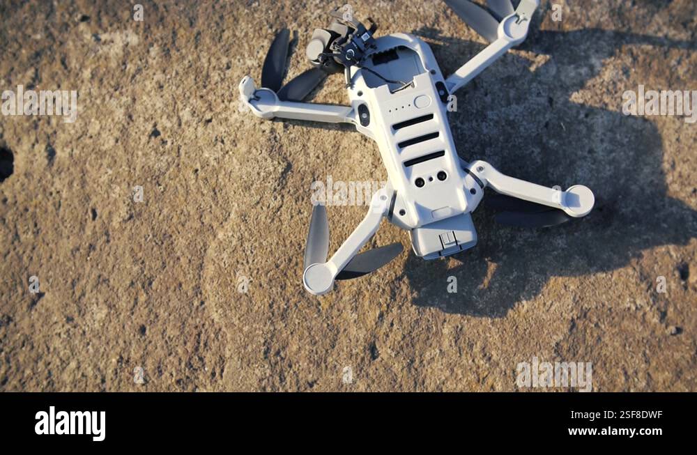 Quadcopter drone fall and crash. Drone crashed in the mountains Stock ...