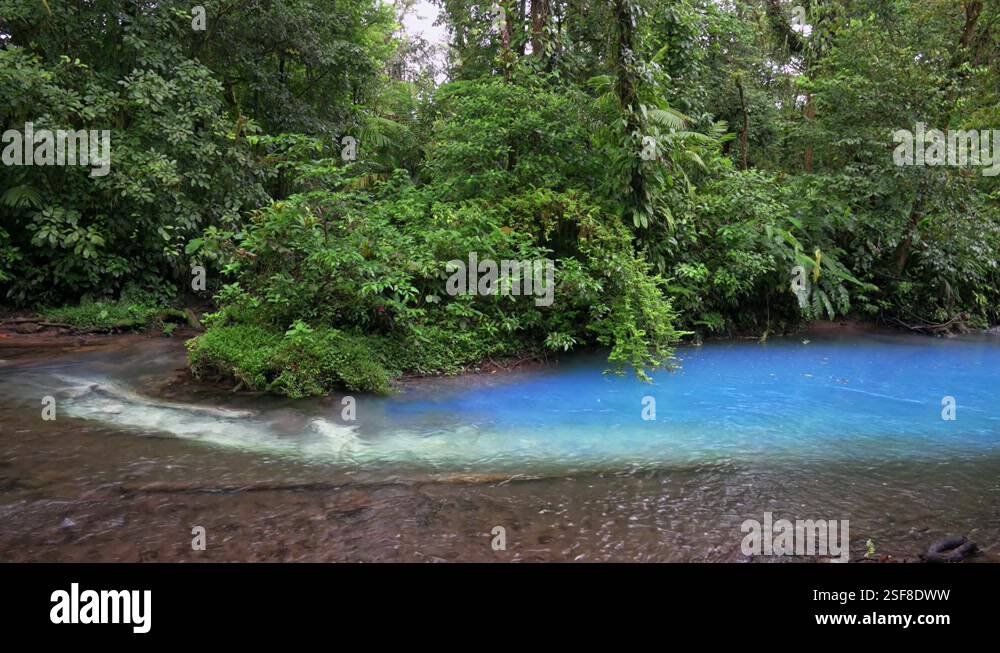the confluence of two rivers the blue river Rio Celeste is formed Stock ...