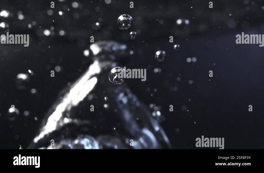 Super Slow Motion Macro Shot of Air Bubbles Flowing in Water at 1000 ...