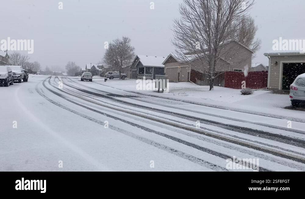 Heavy snowfall builds on Colorado suburban streets in 2022 Stock Video ...
