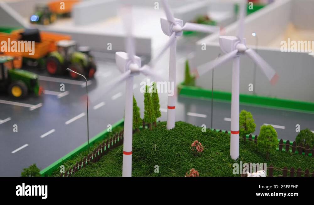 Wind turbines with blades in slow motion field. Alternative energy ...