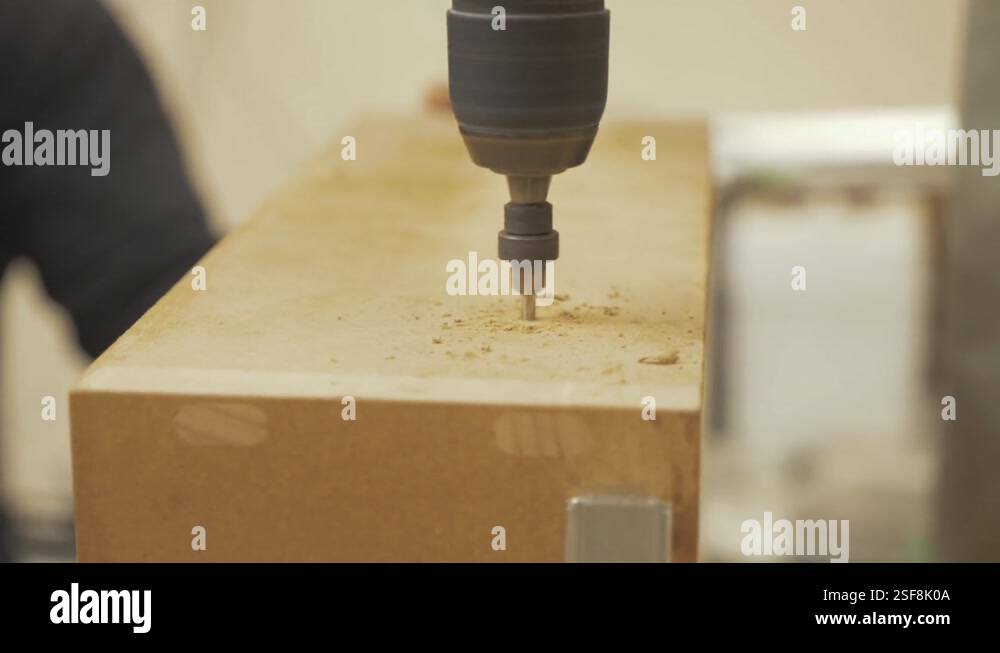 Drilling holes in MDF build shelf Medium Close Up Stock Video Footage ...